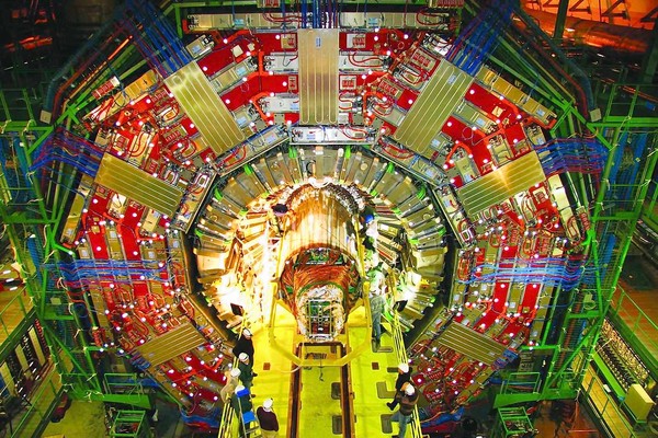 Scientists excited over hints of finding elusive 'God particle' | SikhNet