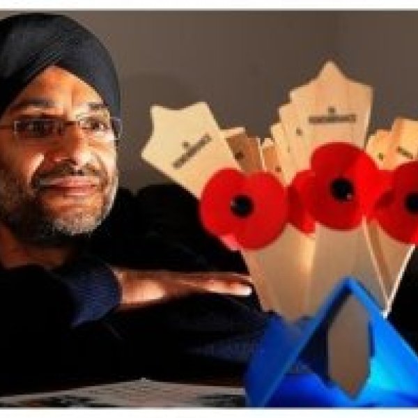 Sikh poppy holder's creator has Royal date after remembrance event ...