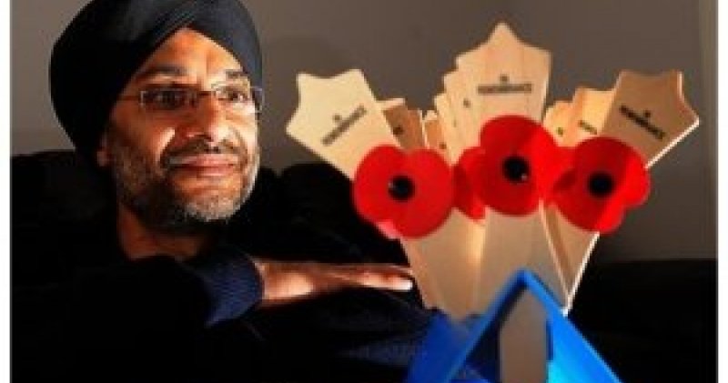 Sikh poppy holder's creator has Royal date after remembrance event ...